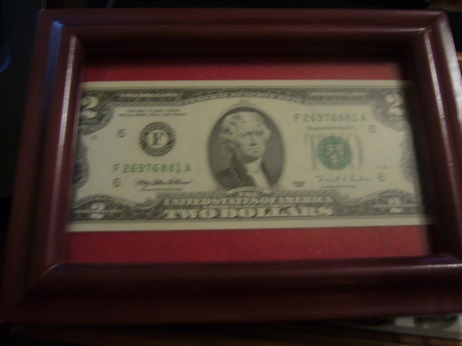1935 two dollar bill in a frame