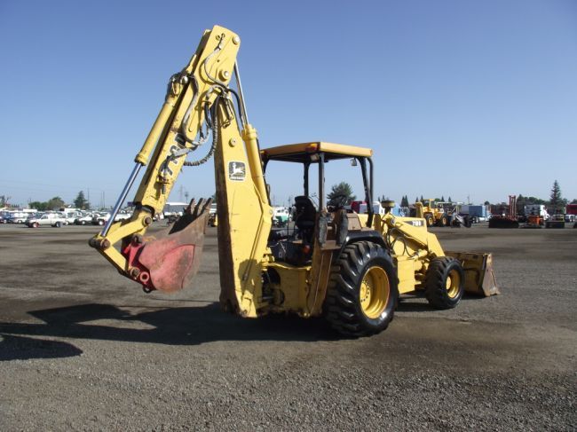 1998 John Deere 710D 4x4 Loader Backhoe