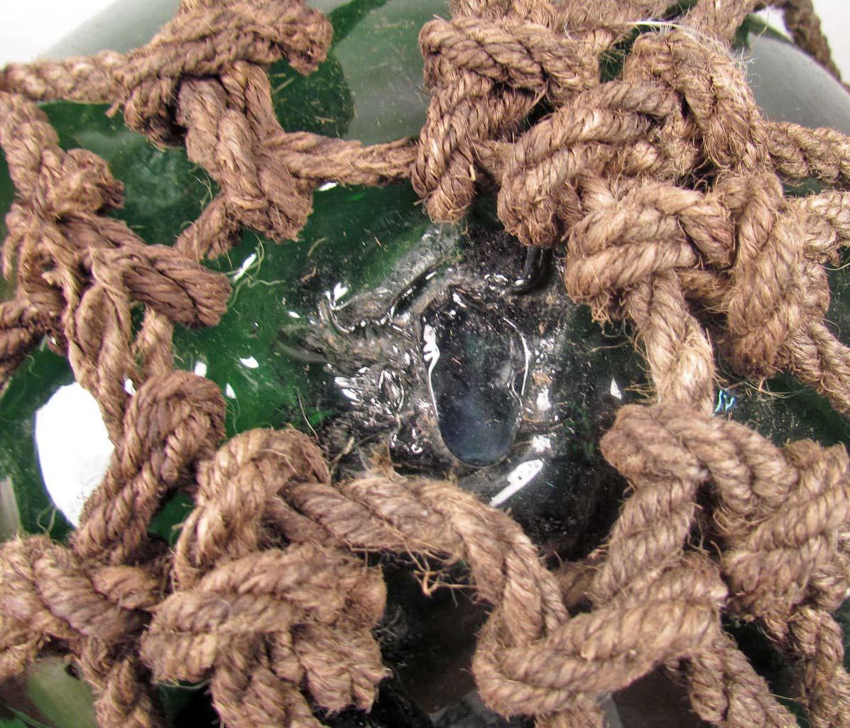 LARGE VINTAGE GREEN GLASS FISHING FLOAT W/ NETTING