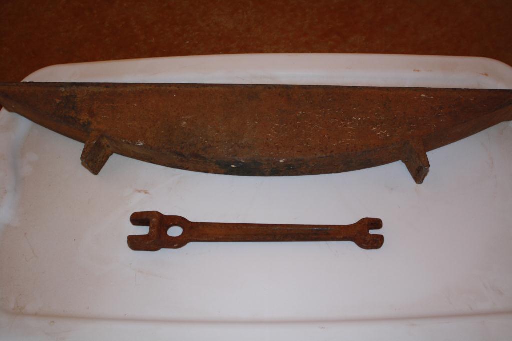 Antique cast iron wagon wheel soaker/oilerand an iron wagon wrench ...