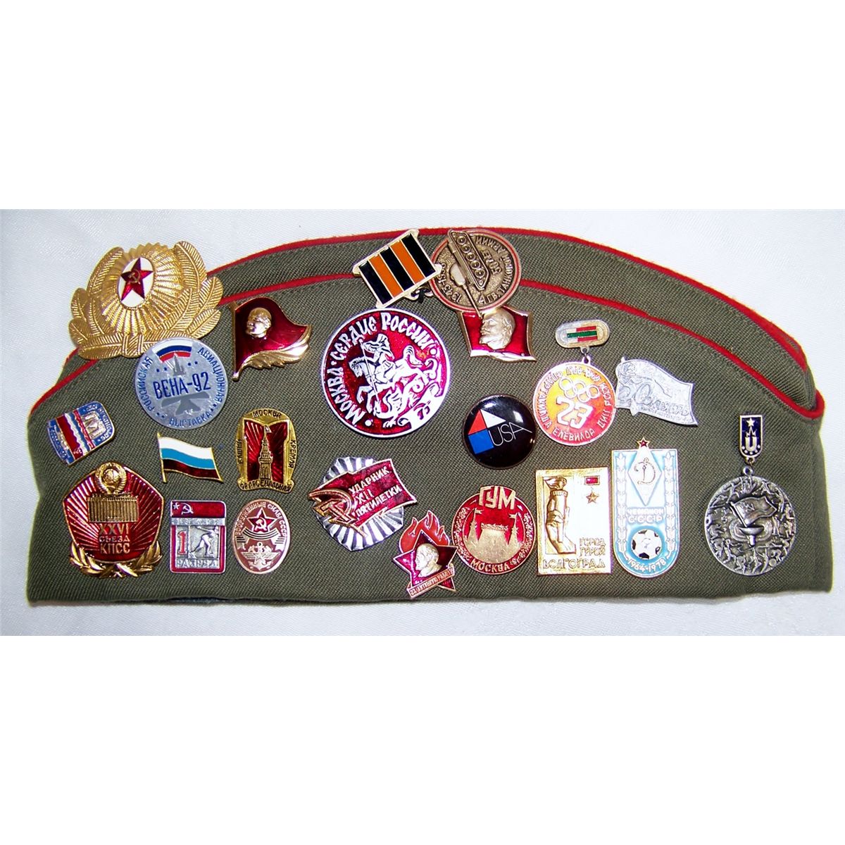 21 Russian Military Pins on a Russian Military Hat.