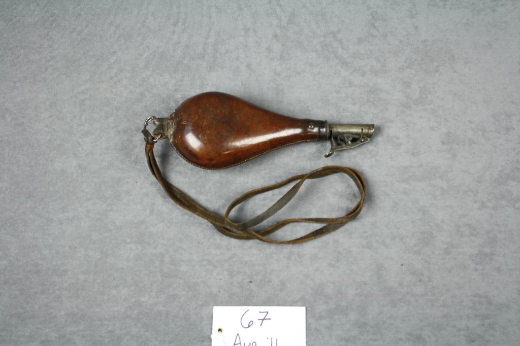 Antique leather bag-shaped powder flask with graduated metal neck spout ...