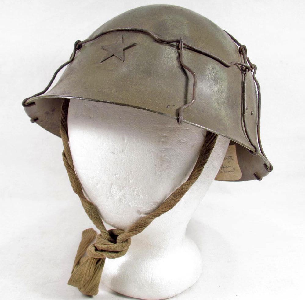 JAPANESE ARMY CAMOUFLAGED COMBAT HELMET W/ WIRE