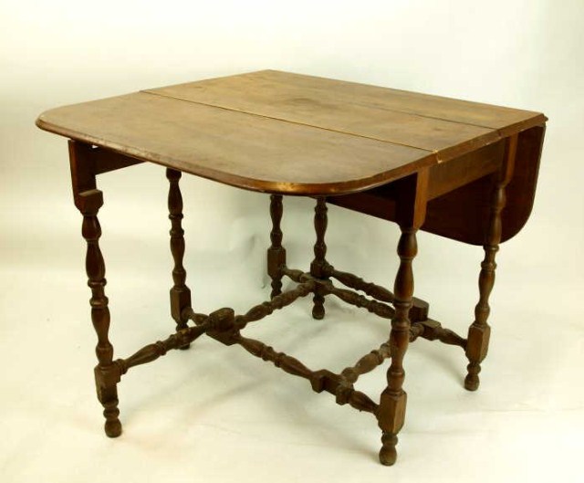 Antique pine drop leaf table with turned legs,