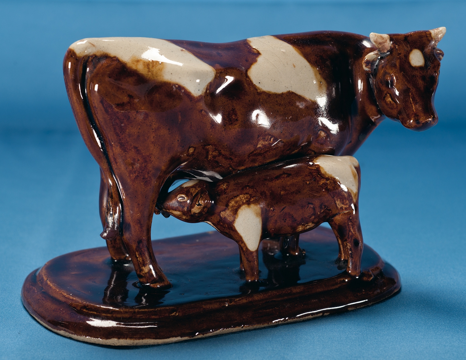 Excellent Midwestern Stoneware Cow and Calf Figural