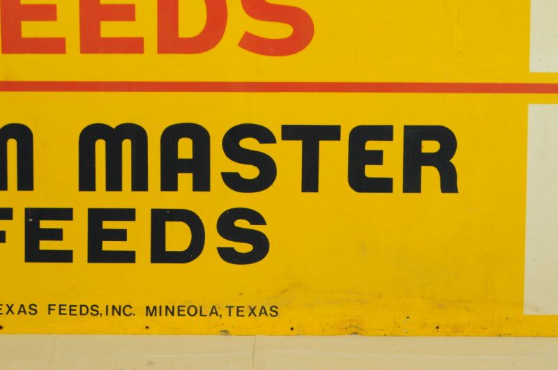 Large East Texas & Farm Master Feeds Tin Sign
