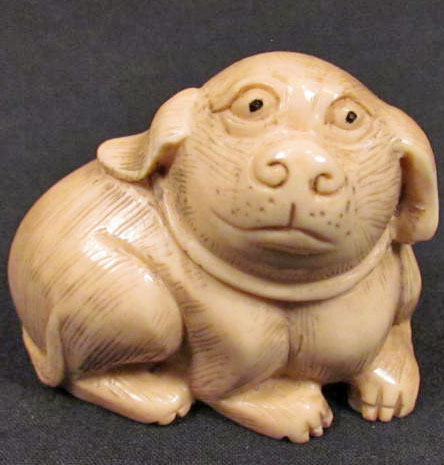 EARLY 20TH CENTURY CARVED IVORY NETSUKE - DOG