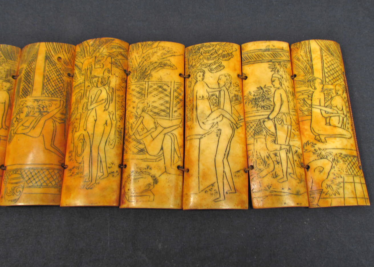 EROTIC YAK BONE SCRIMSHAW W/ ELABORATE ENGRAVINGS
