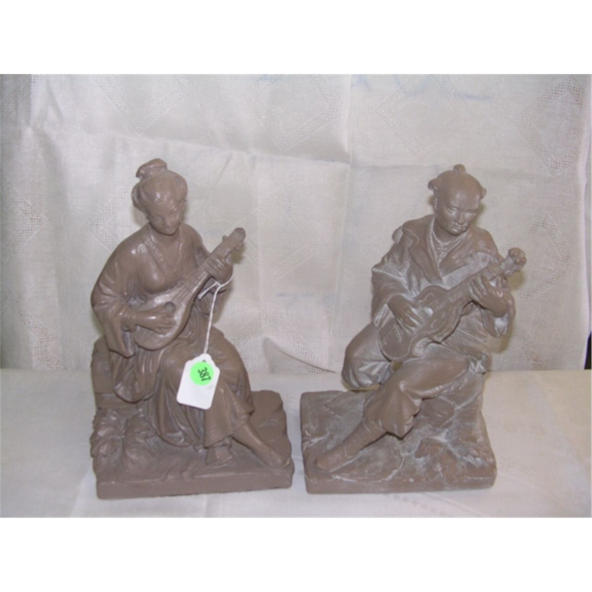 2 piece asian man and woman bookends / figurines