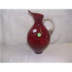 large ruby red glass pitcher