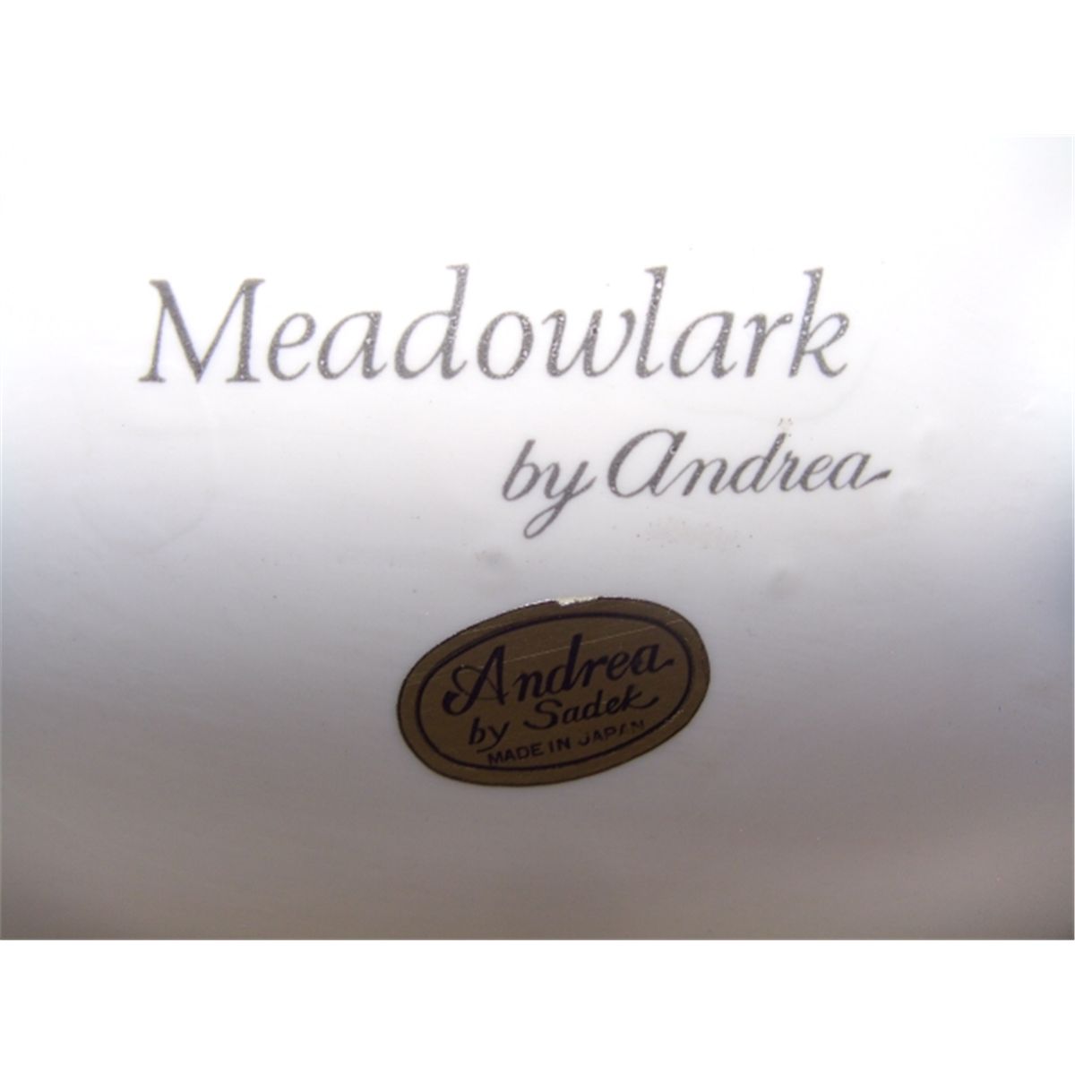 porcelain bird figurine by Andrea Minor Flake / Chip