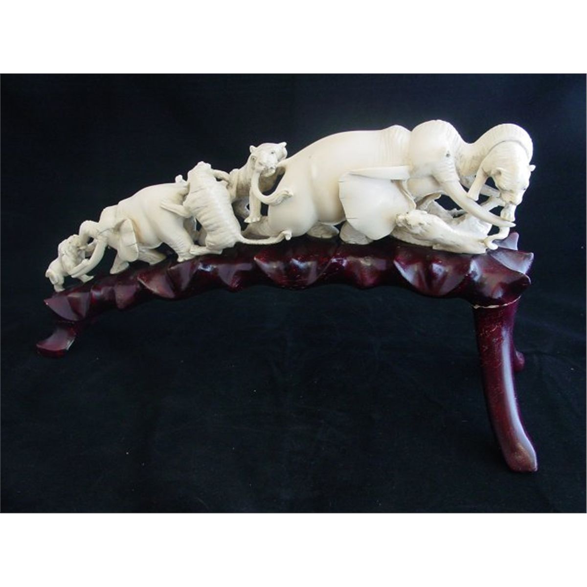 Chinese carved ivory on wood base