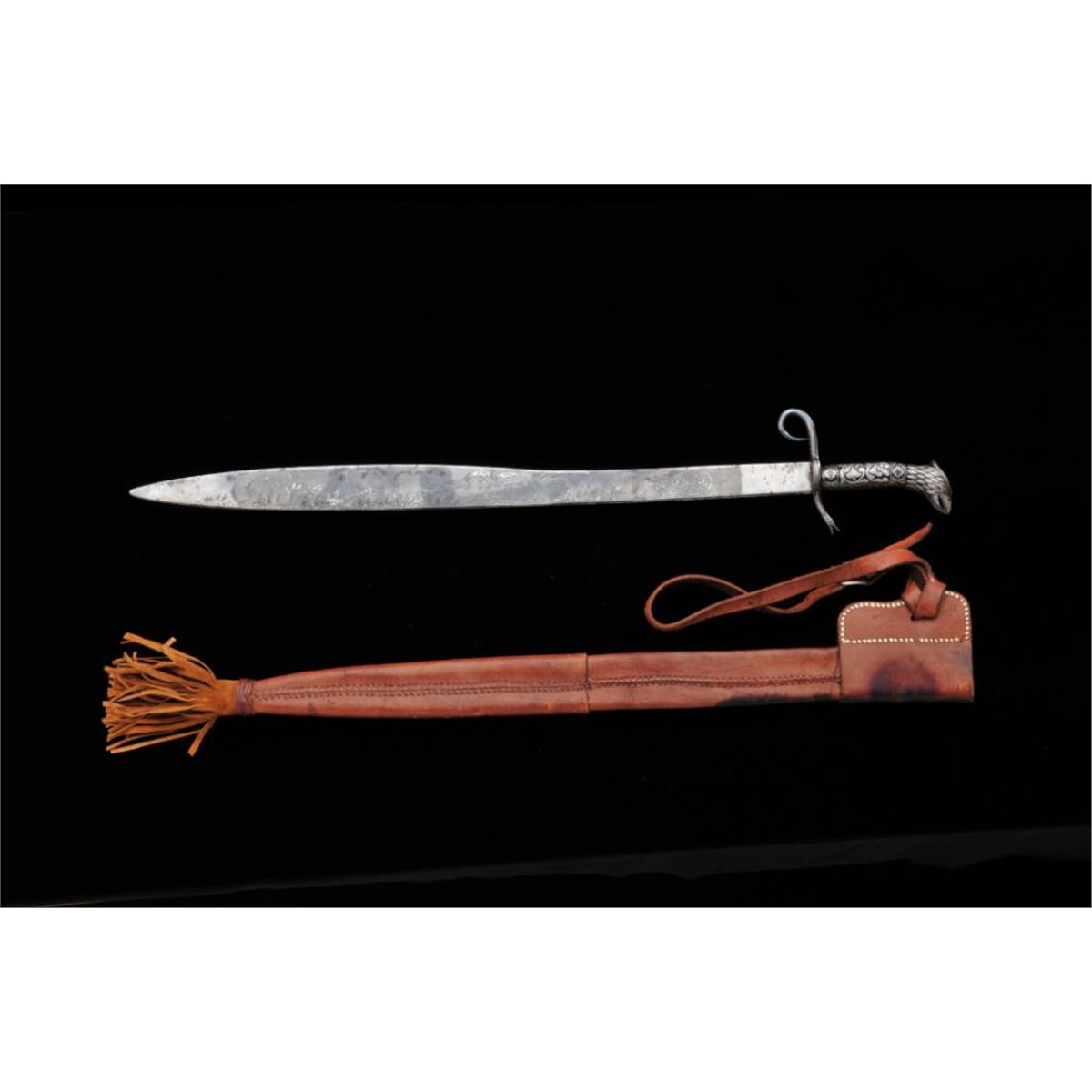 Flamboyant mexican sword with forged steel guard and hilt, showing ...