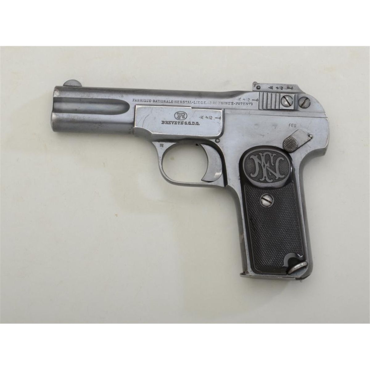FN Model 1900 semi-auto pistol, 7.65mm cal., 4” barrel, blue finish ...