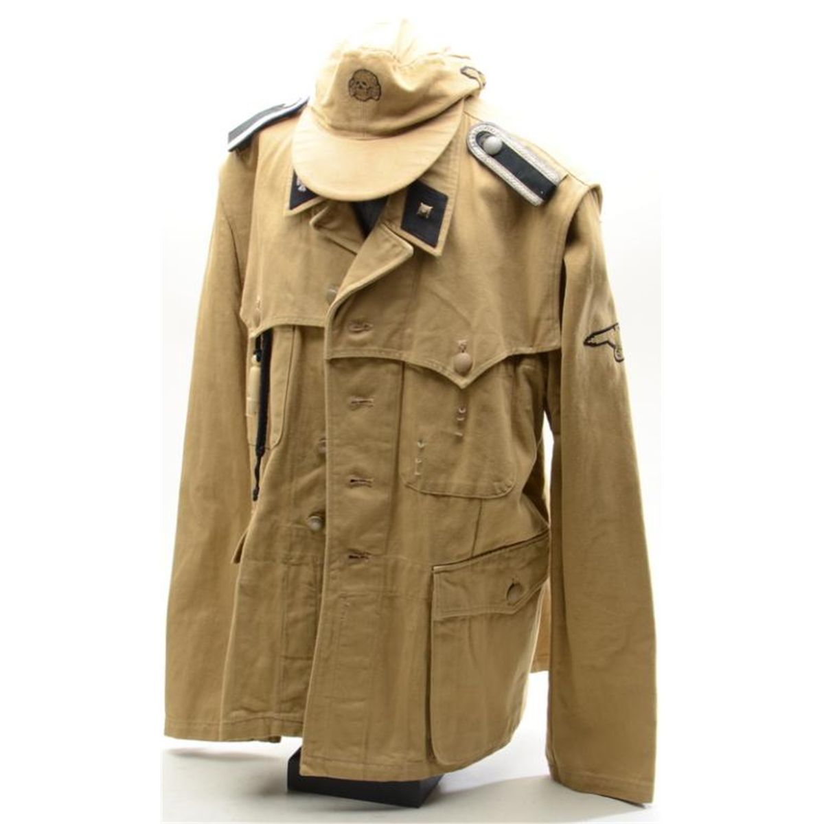 German SS soldier’s tropical uniform jacket, pants, soft cap and ...