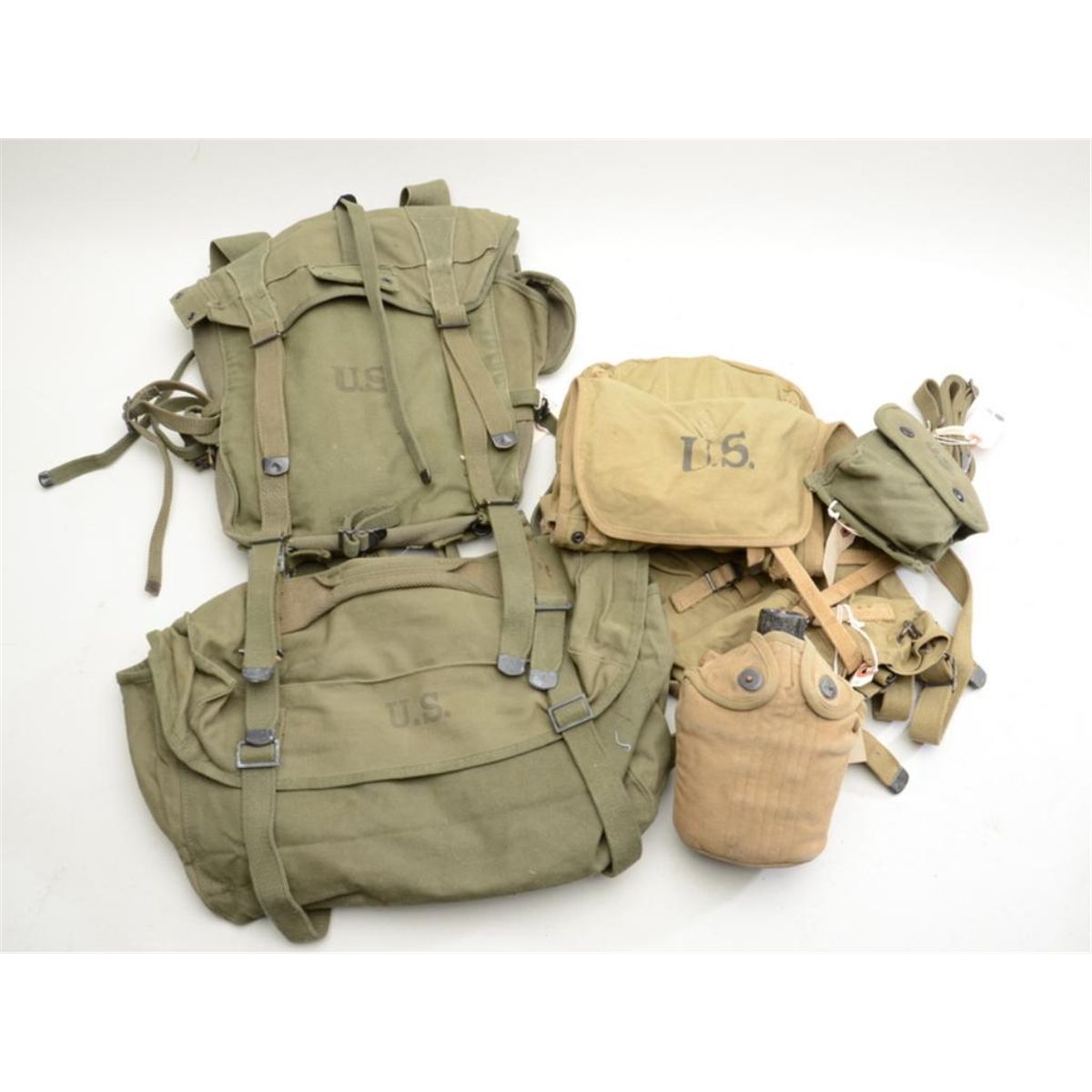 Lot of U.S. Military web gear including pouches, packs, straps, etc ...