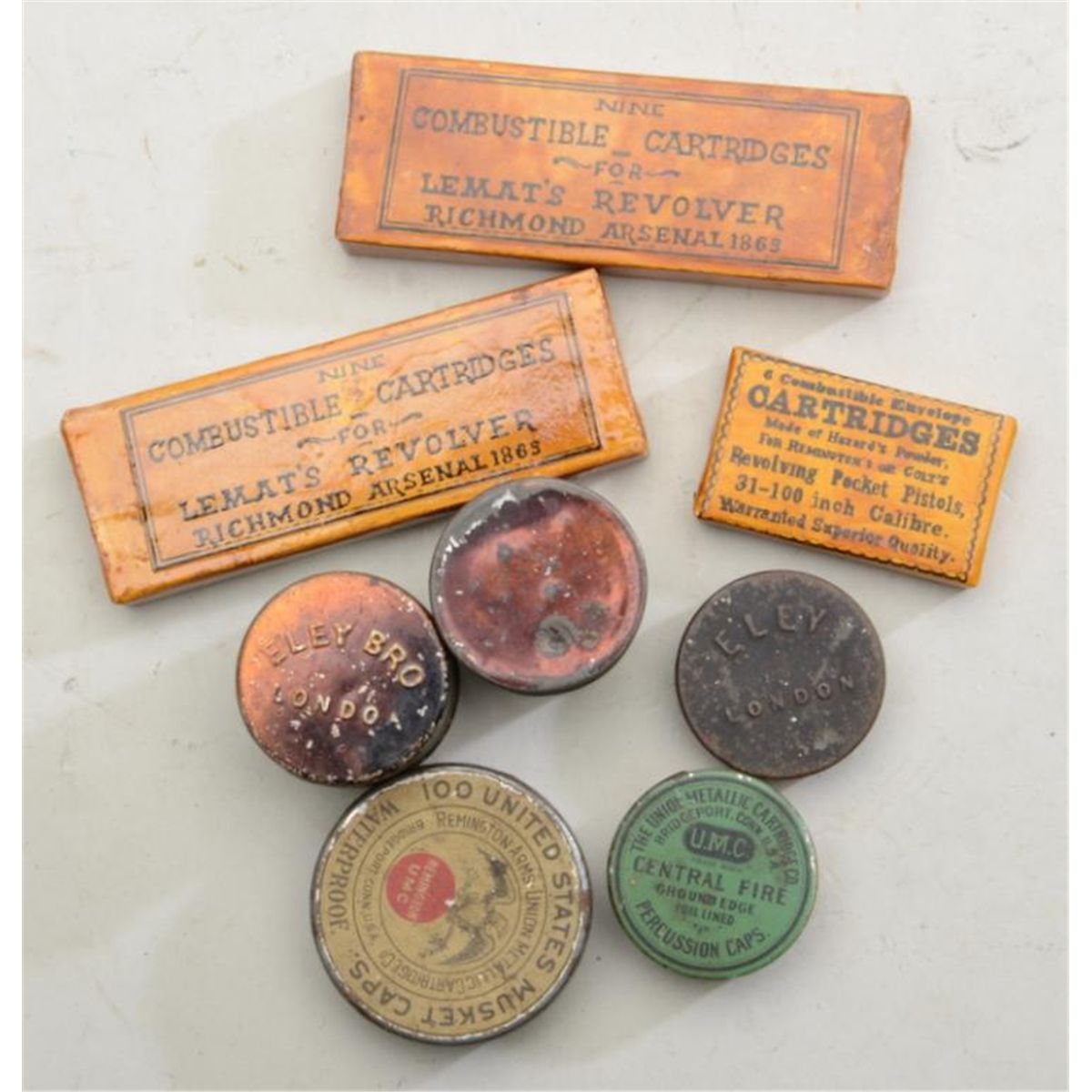 Lot of approx. a dozen cap tins, most original and a lot of approx. a ...