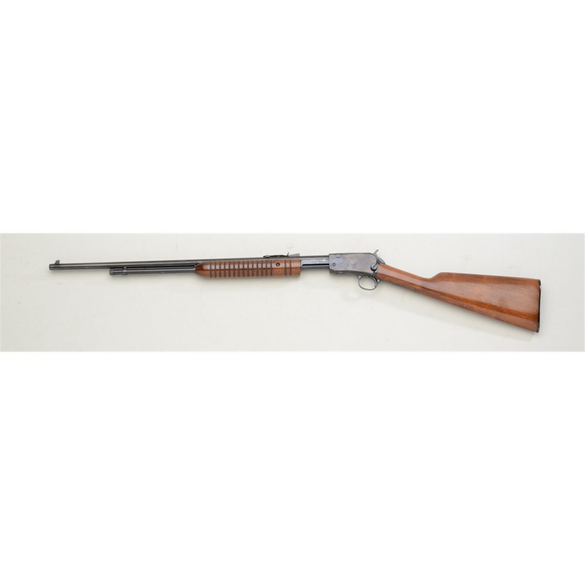 Rossi Model 59 pump action rifle, .22 Mag. cal., 23” round barrel, blue ...