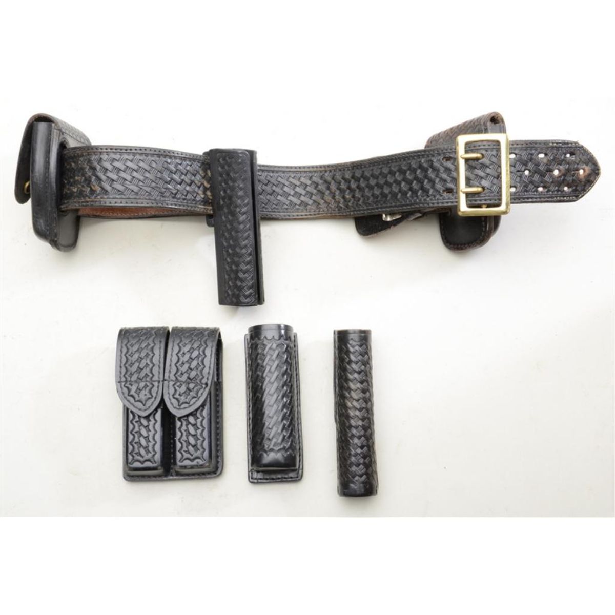 Lot of misc. police basketweave leather including duty belt, handcuff ...