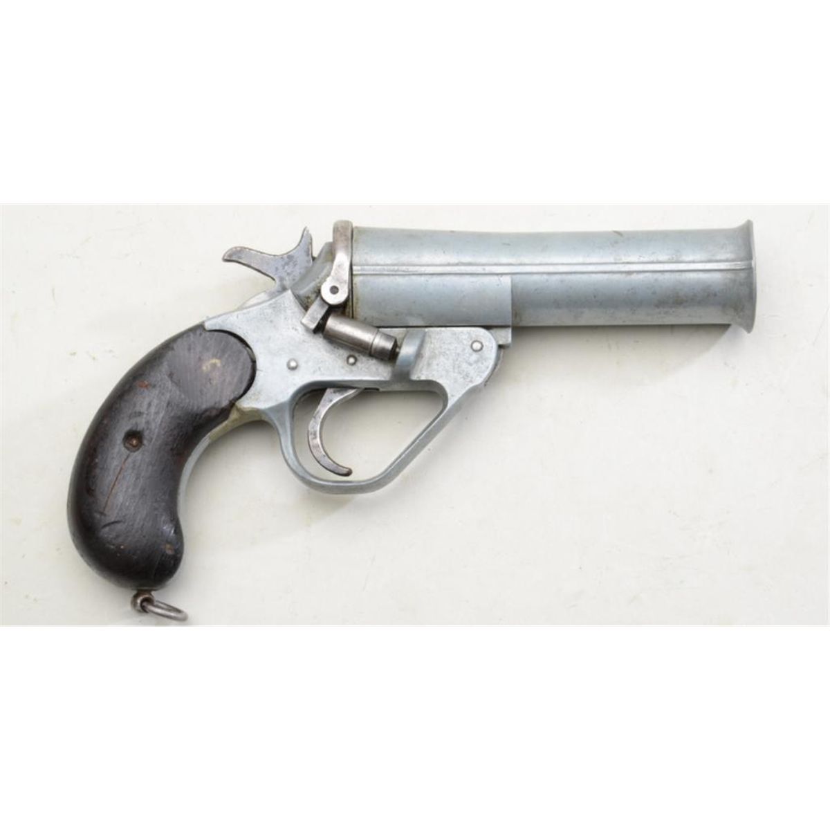 Pot metal military signal pistol, top break, 5-1/2” flared barrel, wood ...