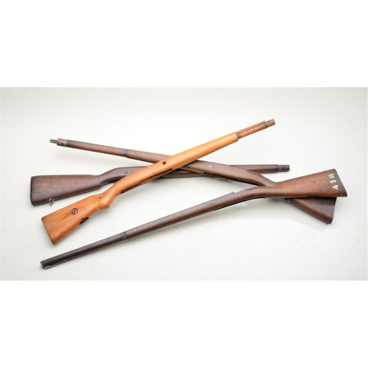 Lot of 10 misc. U.S. and European military wood rifle stocks. Est ...