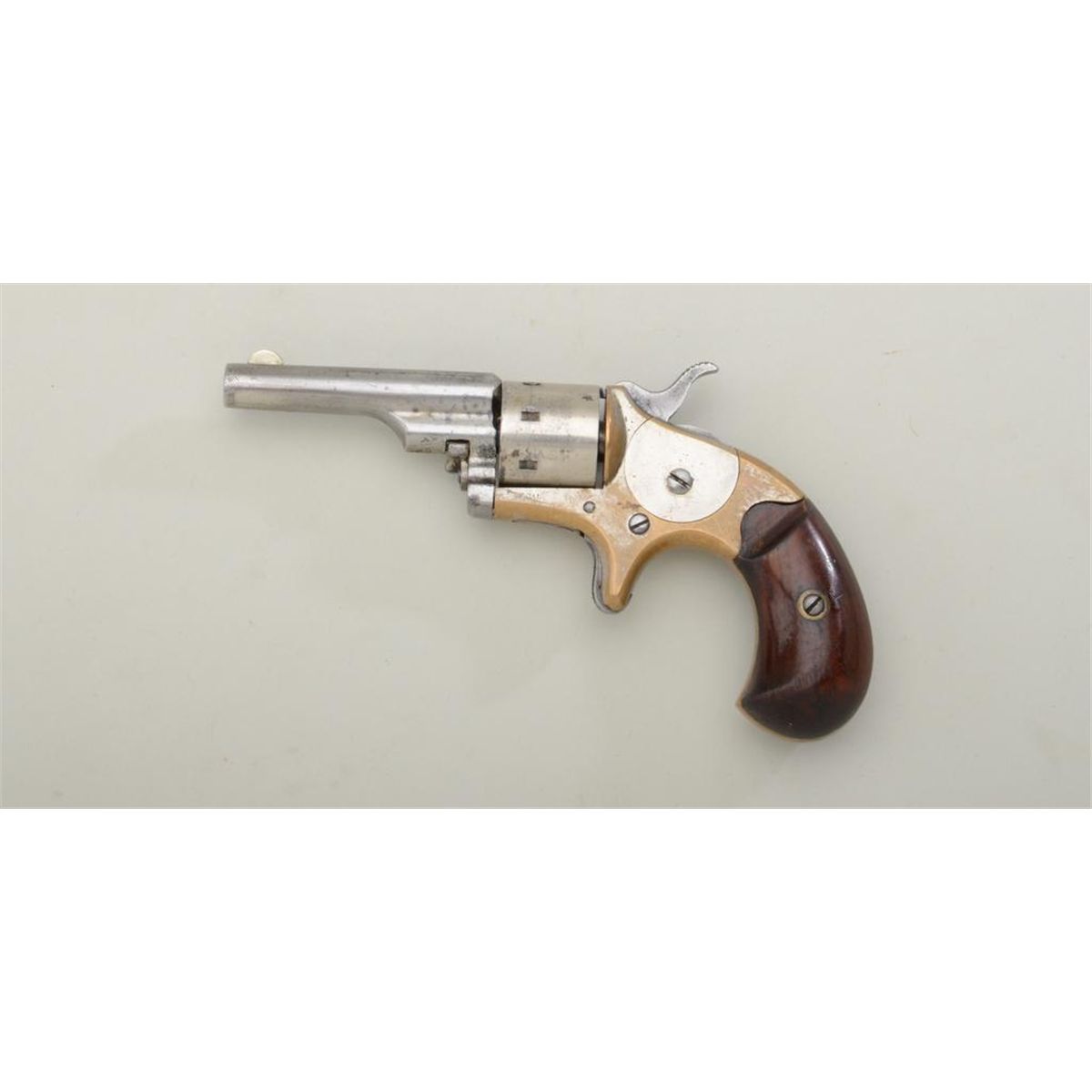 Colt .22 Open-Top spur trigger revolver, .22 cal., 2-1/2” barrel, wood ...