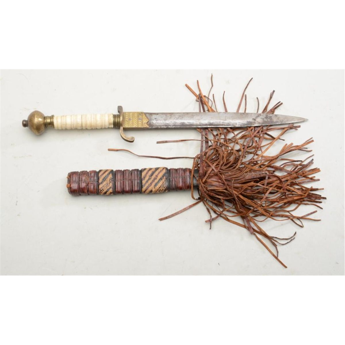 Older African knife with decorative brass hilt, cross guard and pommel ...
