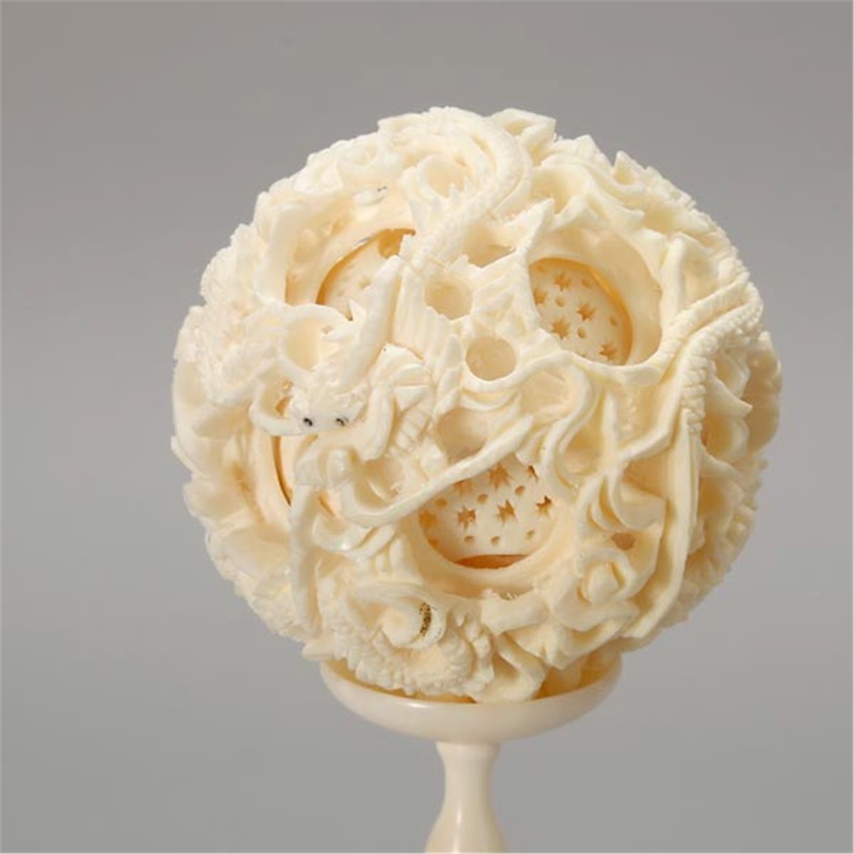 Two Carved Ivory Puzzle Balls*