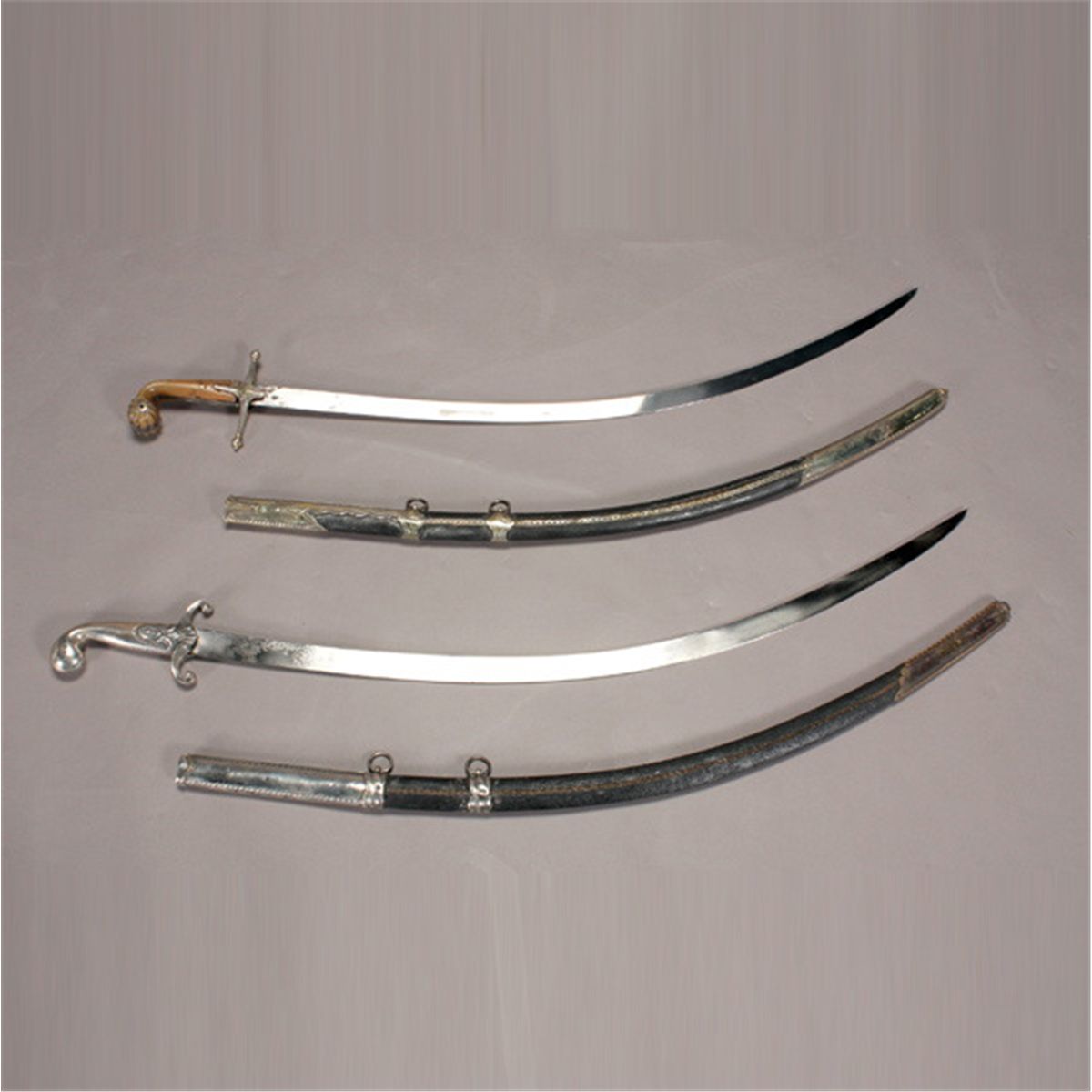 Two Middle Eastern Swords with Scabbards