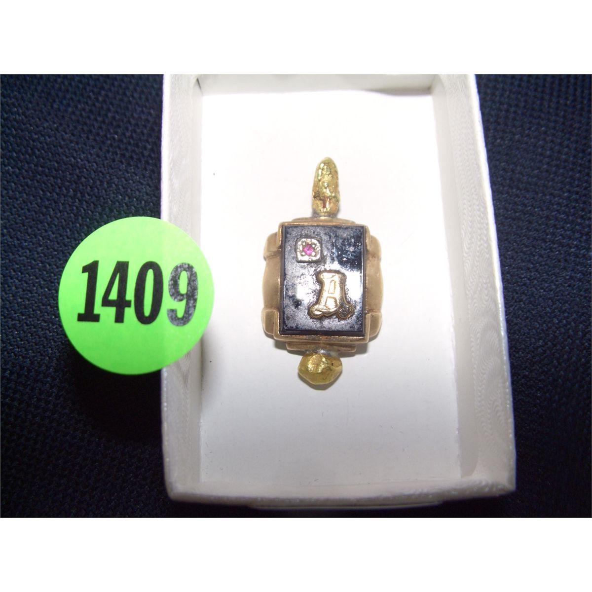 vintage gold and black onyx school pledge pin