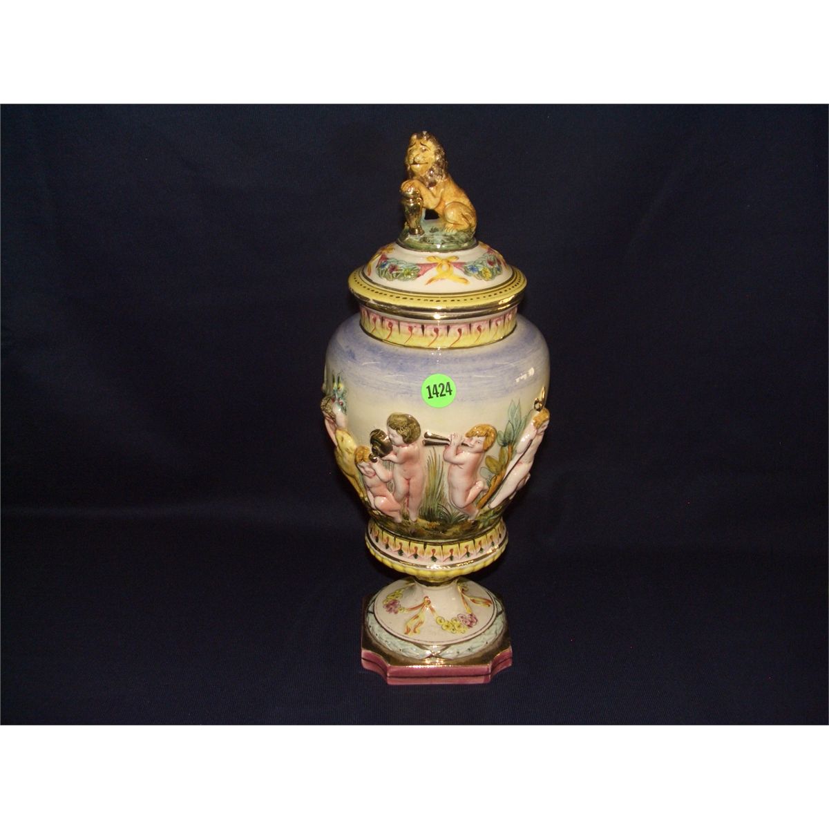 capodimonte urn with lions capped lid and putti base