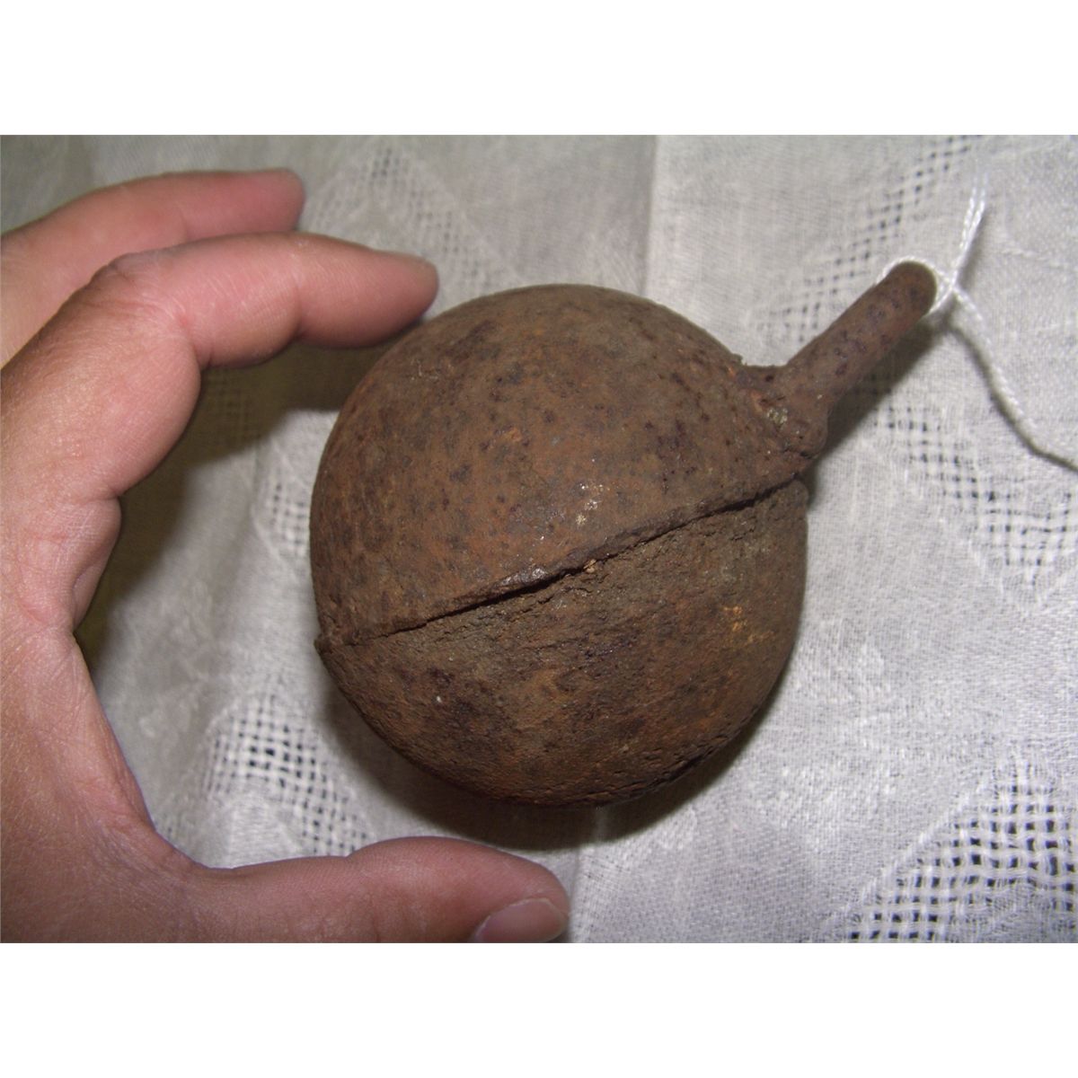 antique ball for chain gang or lead fishing weight?