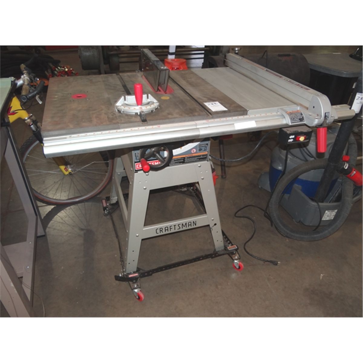 CRAFTSMAN TABLE SAW W/CASTERED STAND;