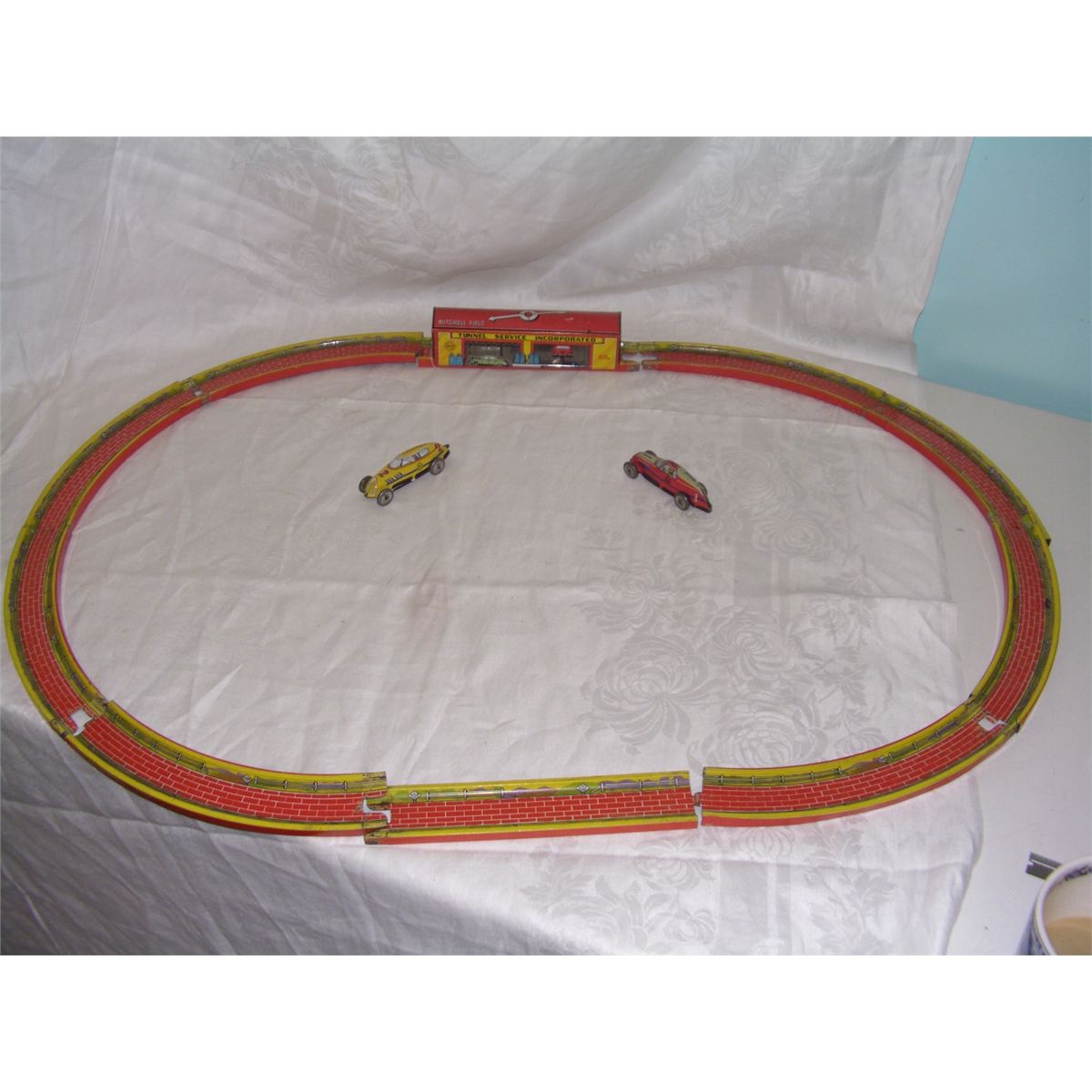 Marx 1940's oval race track with cars and tunnel, goes together great