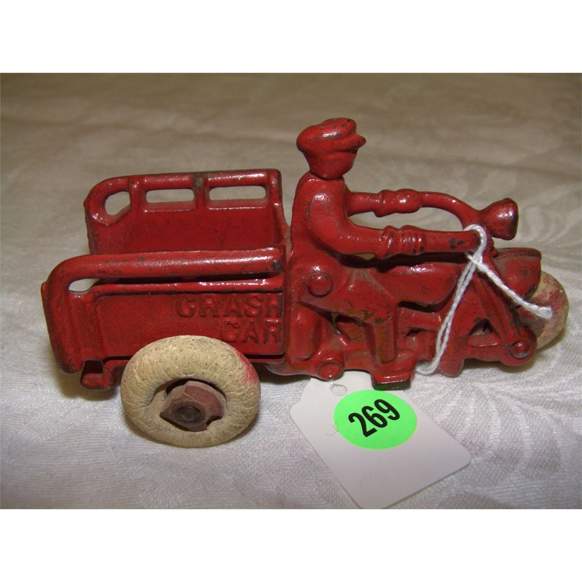 antique cast iron toy crash car toy motorcycle and driver