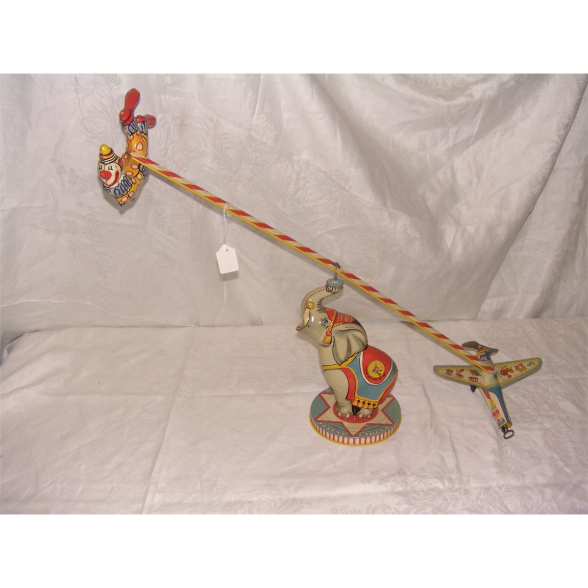 12" tall Unique Art toy Co, rare flying circus wind up toy