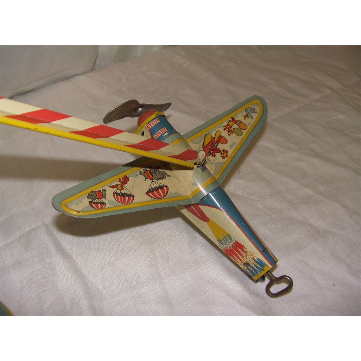12" tall Unique Art toy Co, rare flying circus wind up toy
