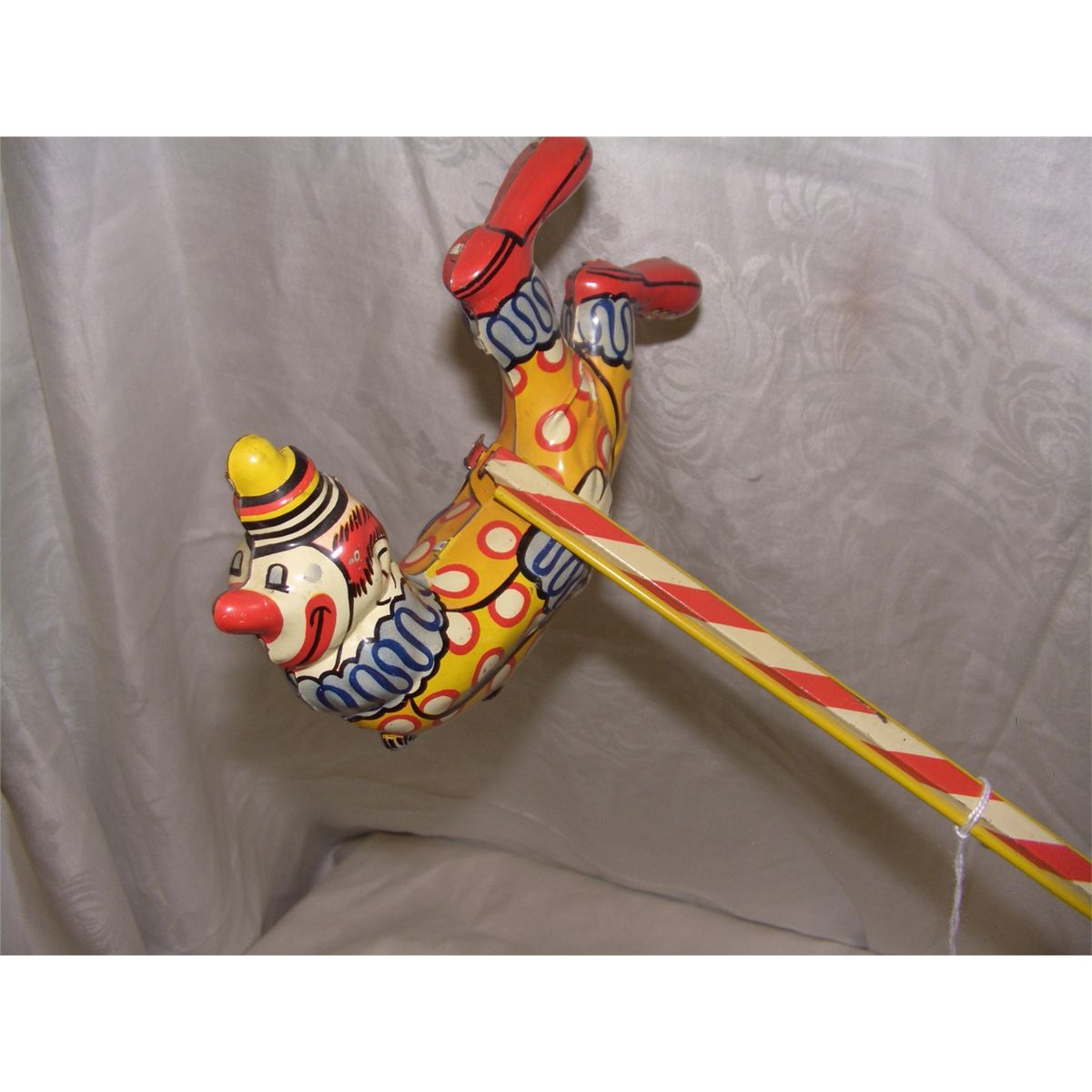 12" tall Unique Art toy Co, rare flying circus wind up toy