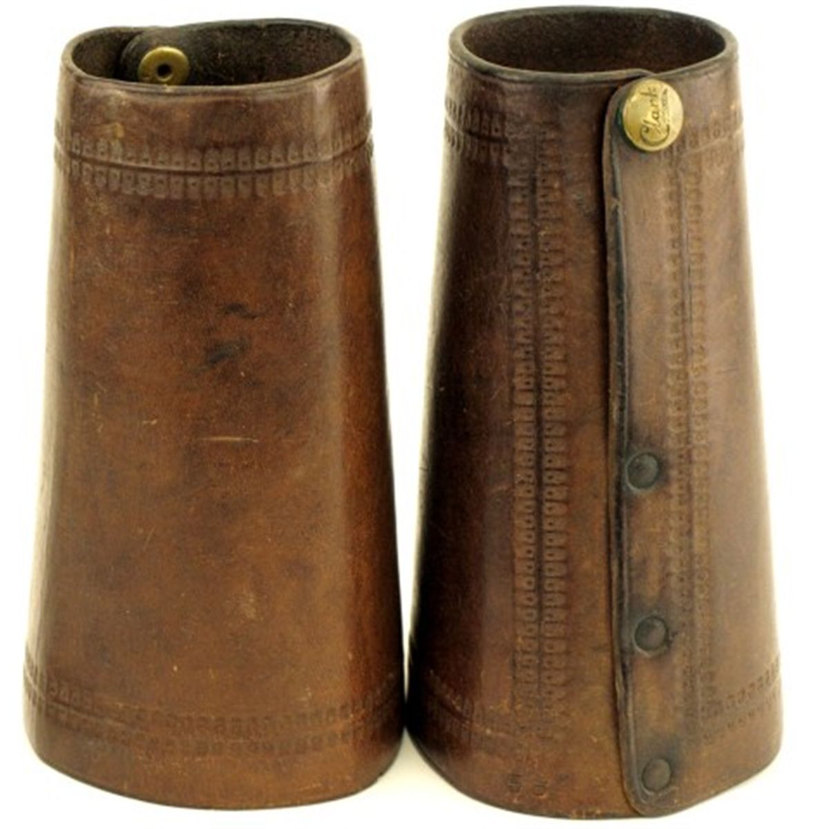 Pair of early Clark cowboy leather cuffs