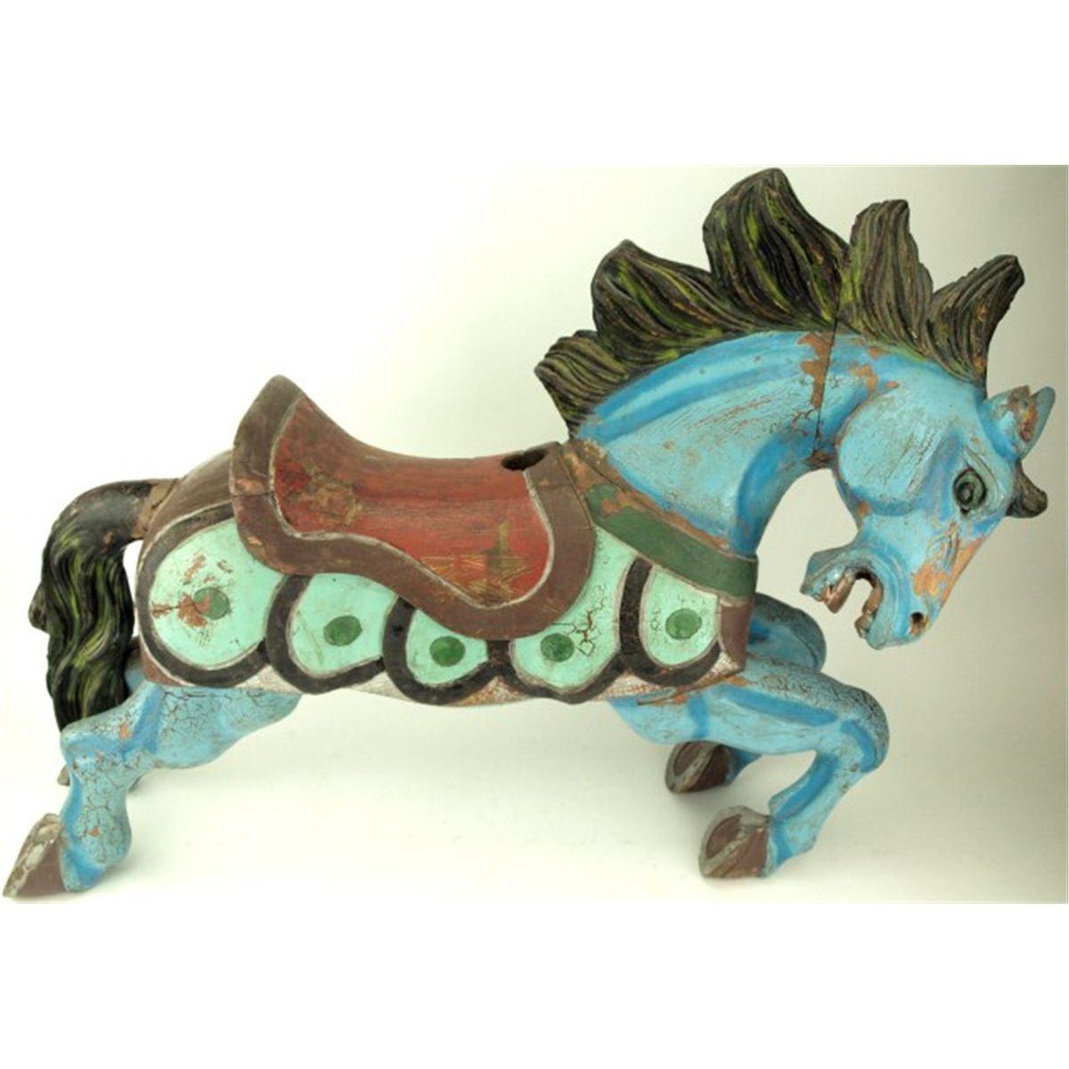 Carved wooden carousel horse