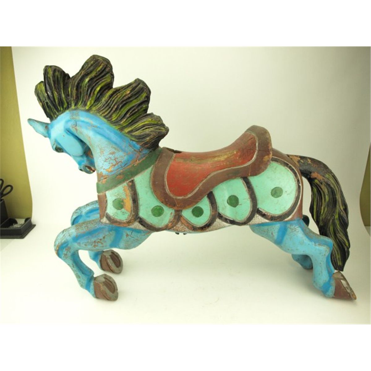 Carved wooden carousel horse