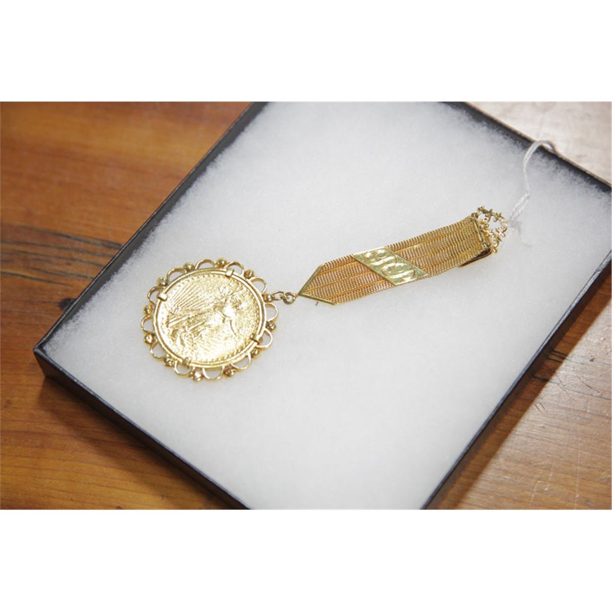 1908 GOLD COIN. Saint-Gaudens twenty dollar double eagle coin. In a ...