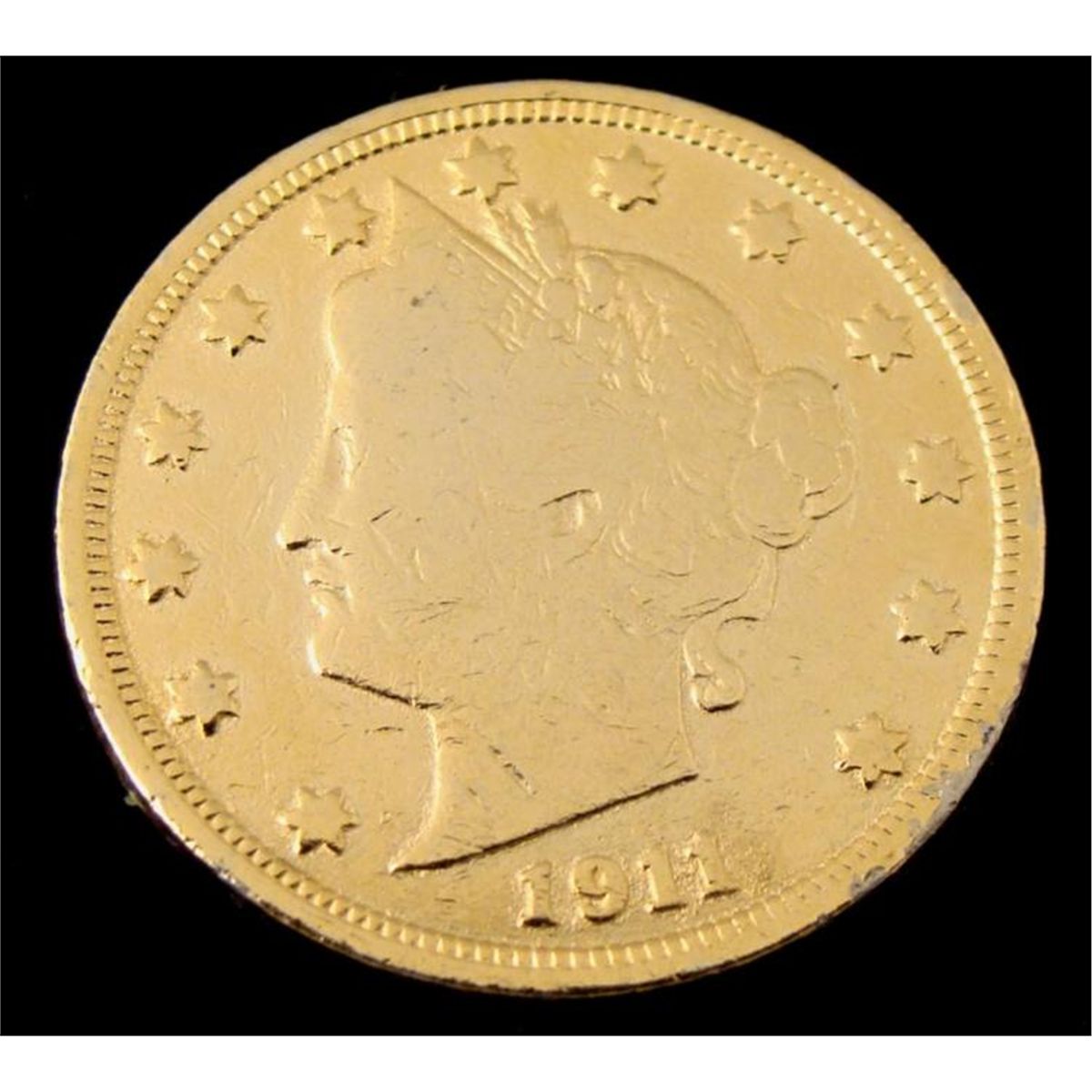 1911 Gold Racketeer Liberty V Nickel coin