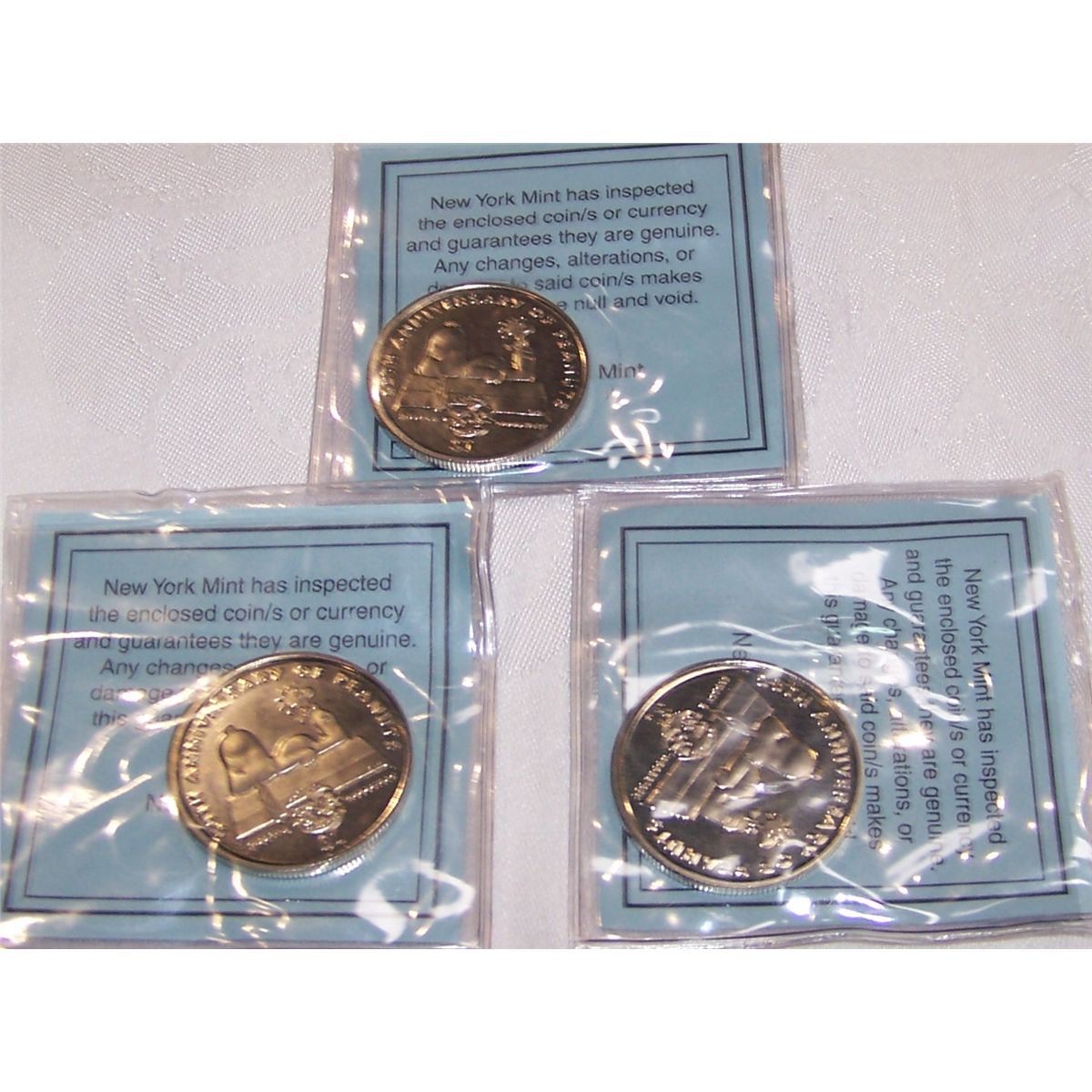 (3X The Bid) 50th Anniversary of Peanuts $1 Coins.