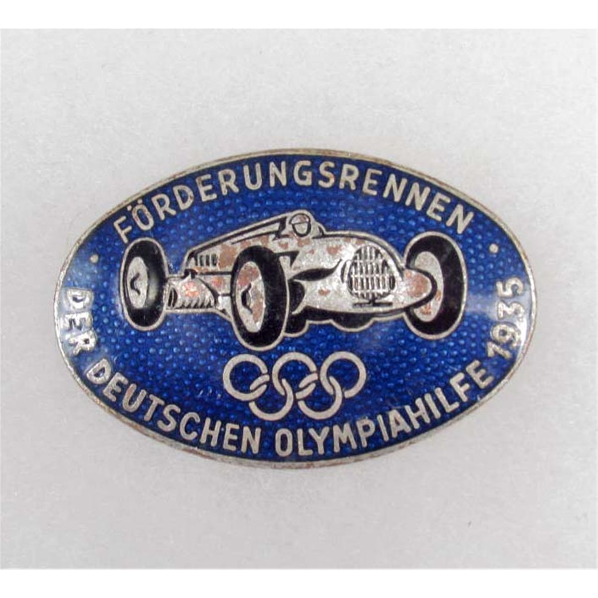 GERMAN NAZI 1936 BERLIN OLYMPICS ENAMELED RACE CAR BADGE