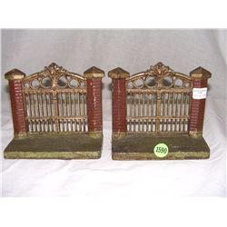 2 piece antique cast iron bookends shape of fence / gates