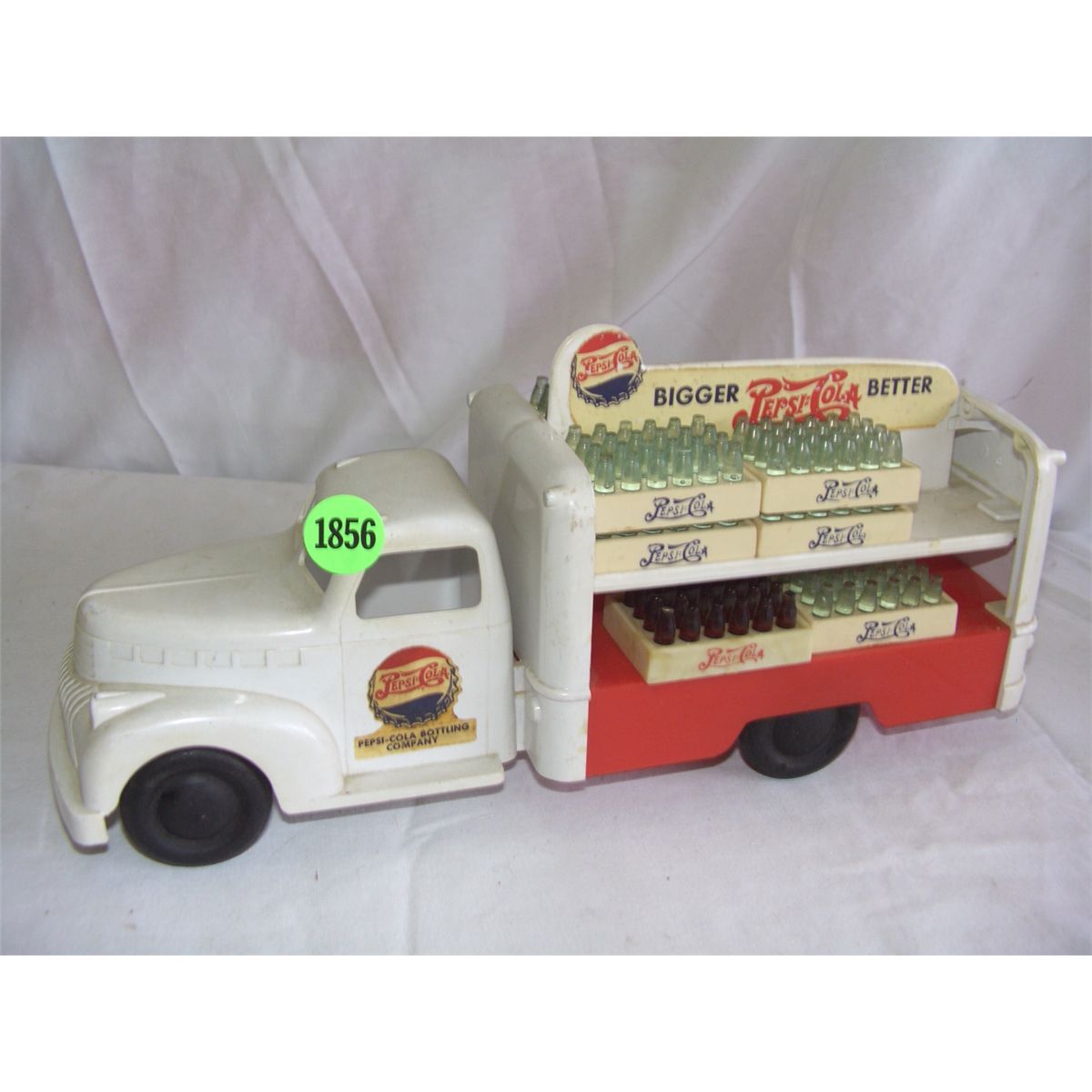 vintage child's plastic Pepsi toy truck with bottles