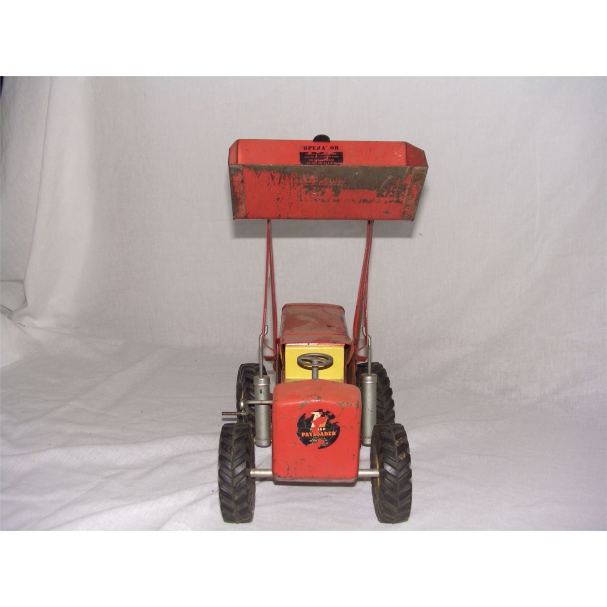 vintage metal crank pay loader toy