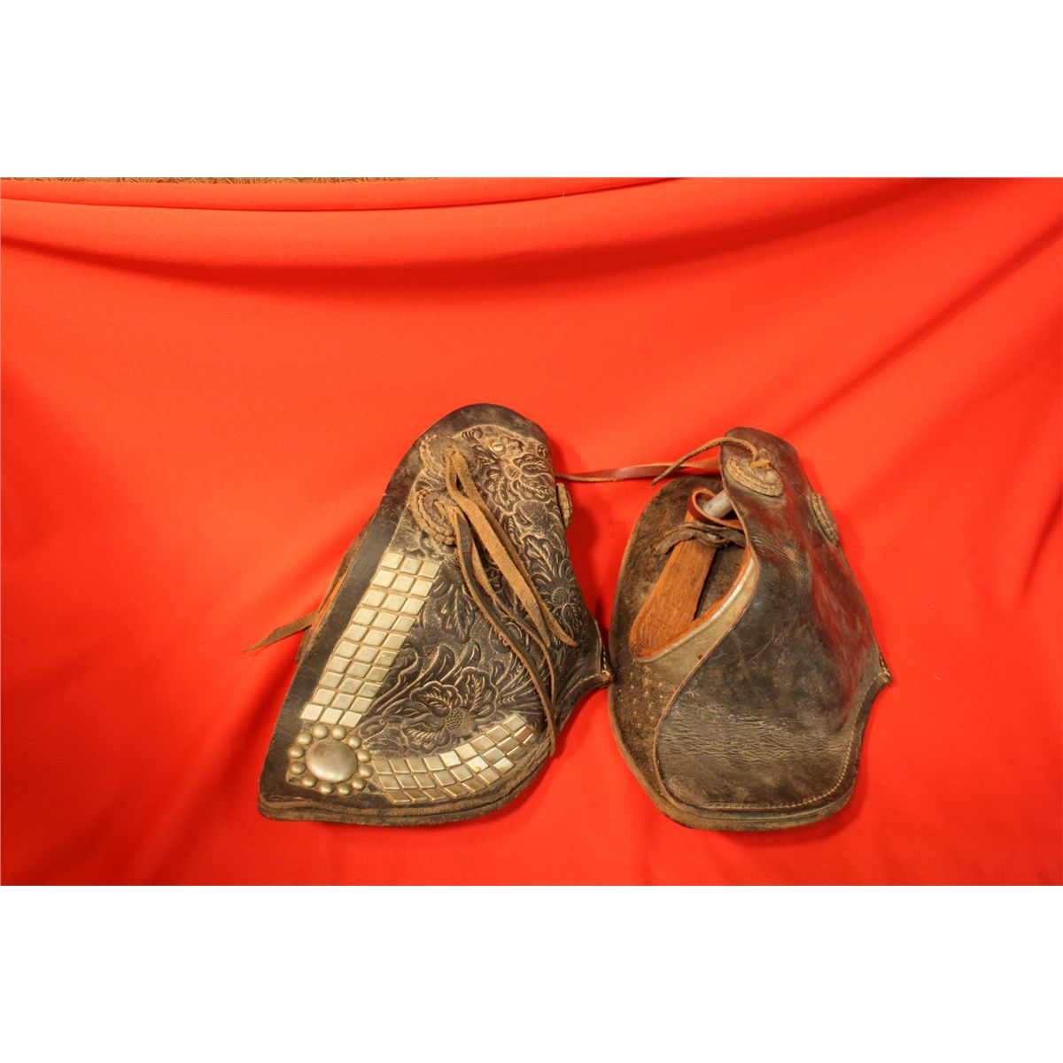 Tapaderos, studded, hand tooled Est. $75-100