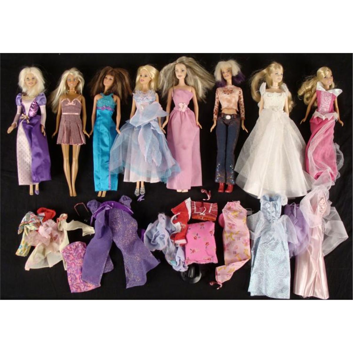 Collection of 8 Barbie Dolls + Extra Clothes, Outfits